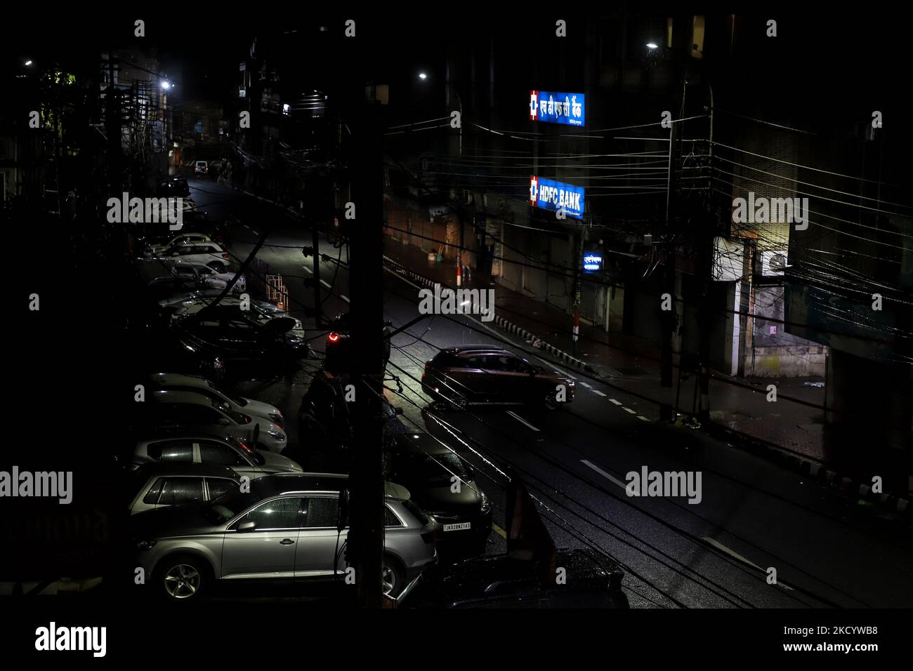 HDFC Bank board illuminates during an evening in Jammu City, Jammu and ...