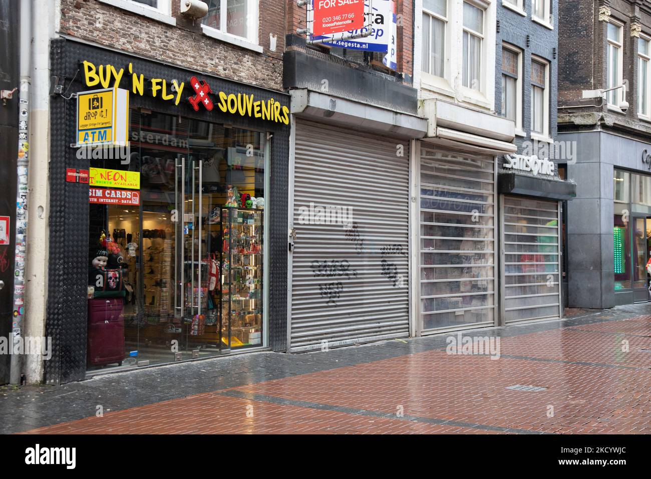 Empty commercial streets with shops closed. Quiet, almost deserted from ...