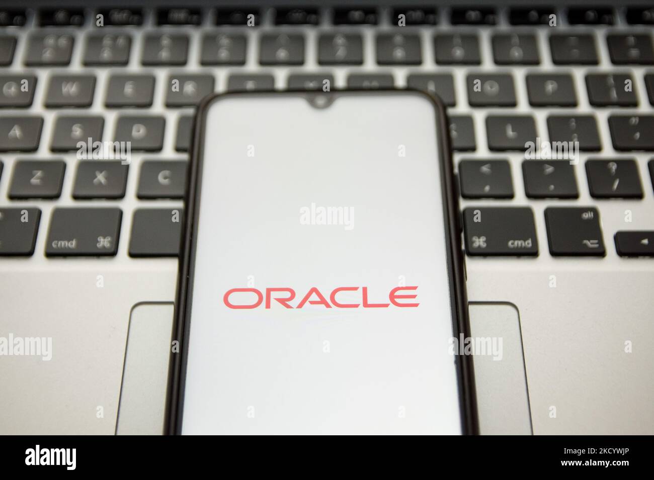 In this photo illustration an Oracle logo seen displayed on a ...