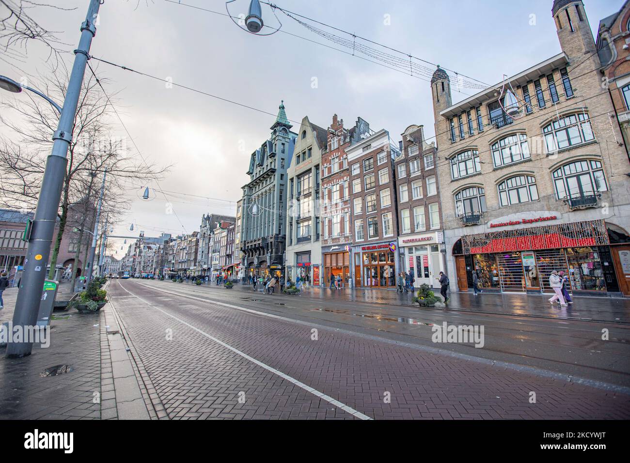Quiet, almost deserted from local people and tourists streets of ...
