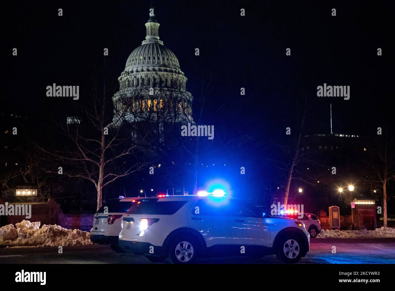 Police cars sit outside of the U.S. Capitol on January 6, 2022, the one ...