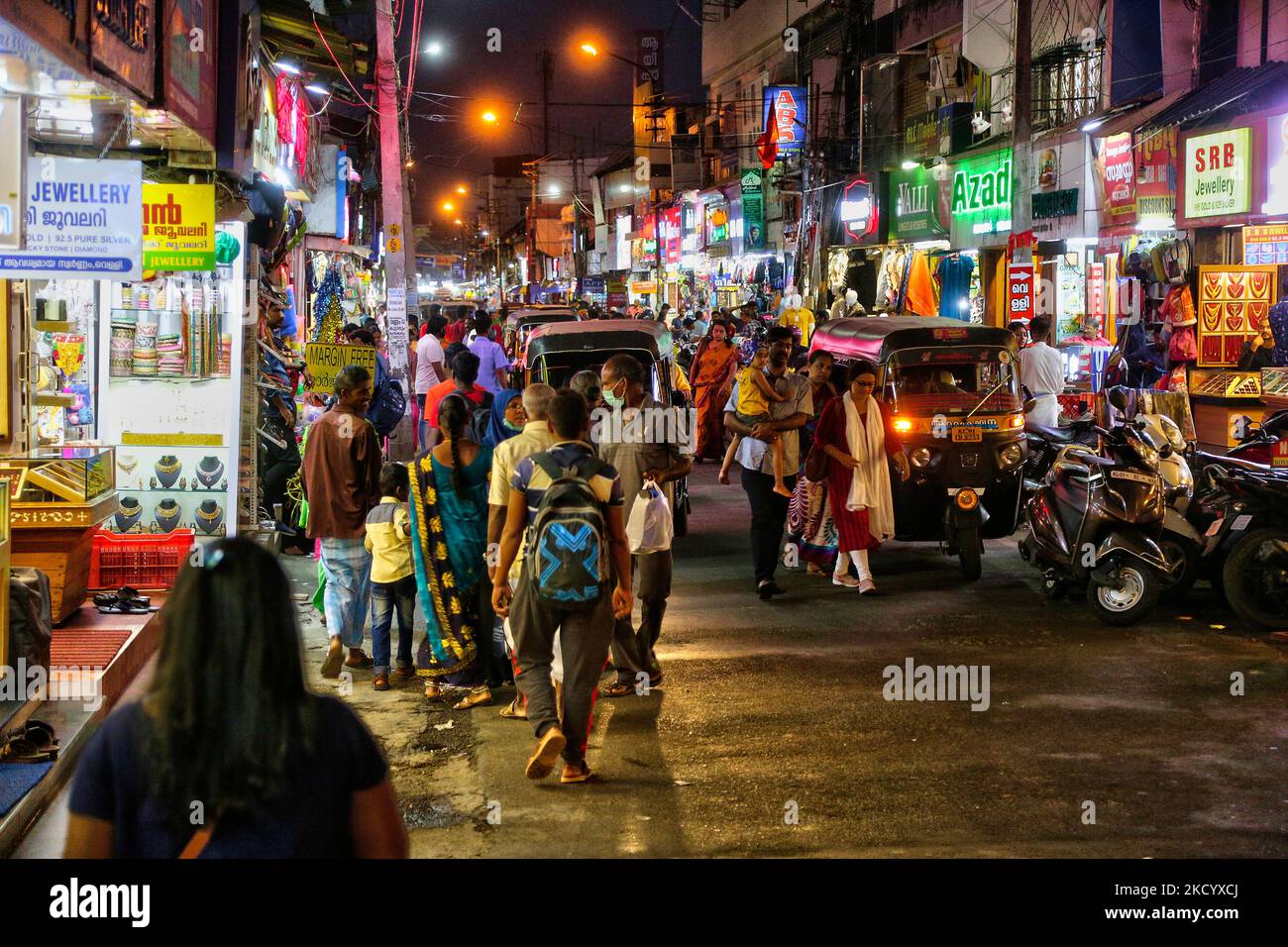 Crowded street lined with shops in the East Fort area of the city of ...