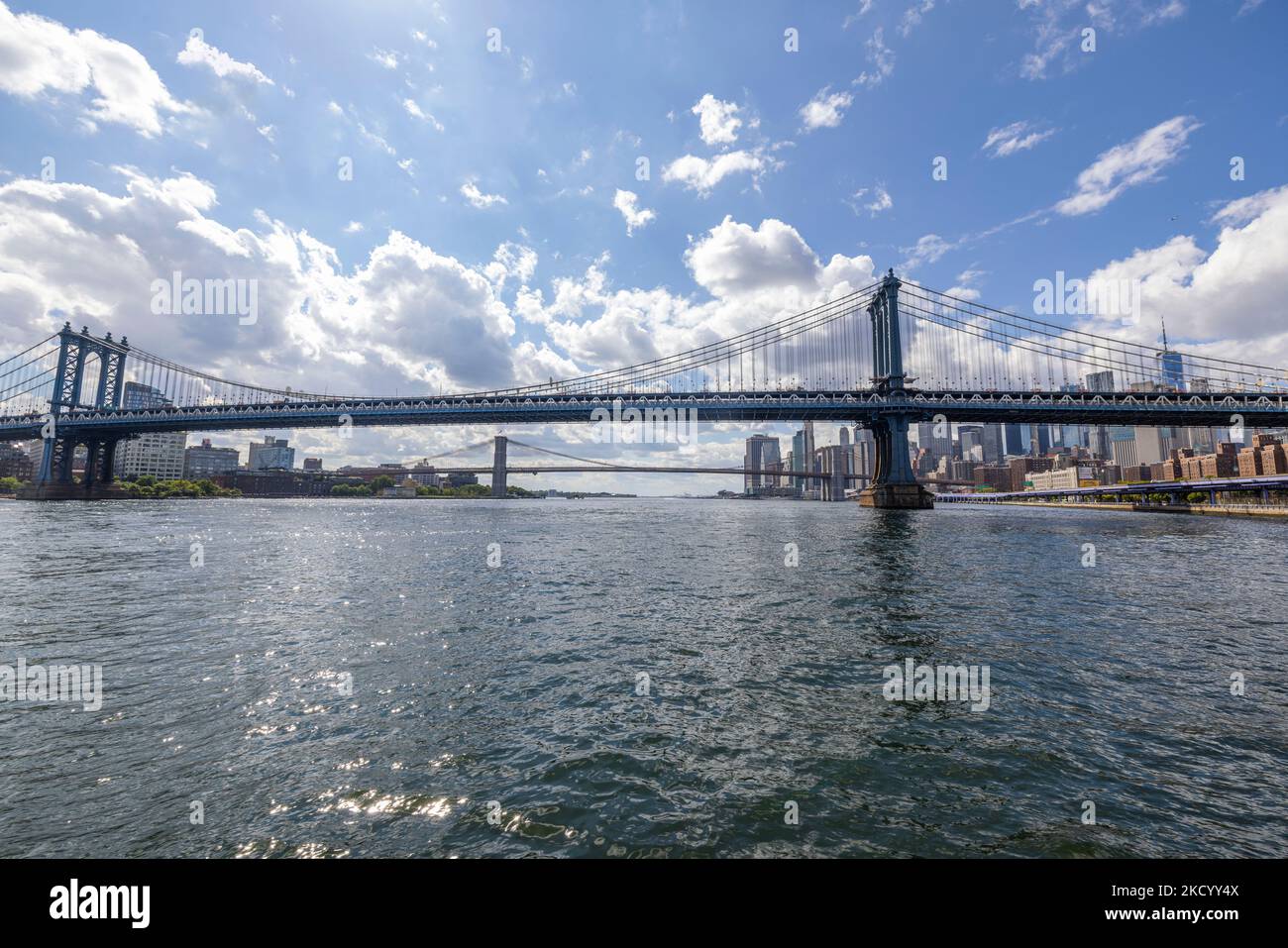 Beautiful view of Brooklyn bridge over Hudson river and skyscrapers of Manhattan. USA Stock ...