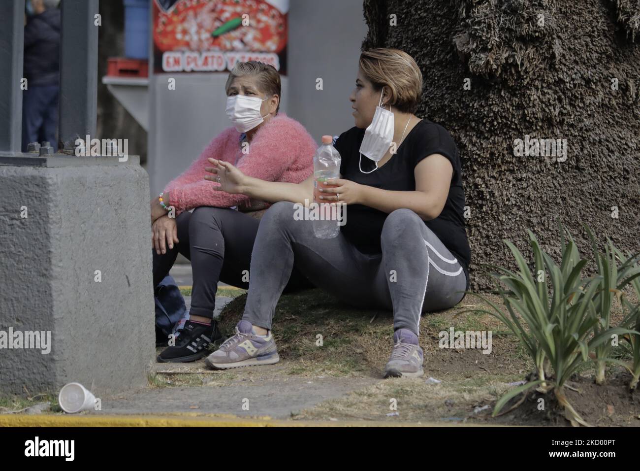A group of people outside the COVID-19 emergency area of a hospital in ...