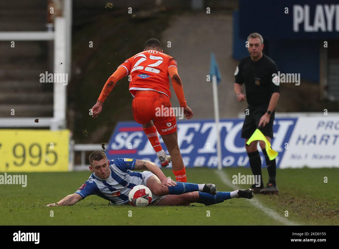David Ferguson of Hartlepool United tackles CJ Hamilton of Blackpool ...