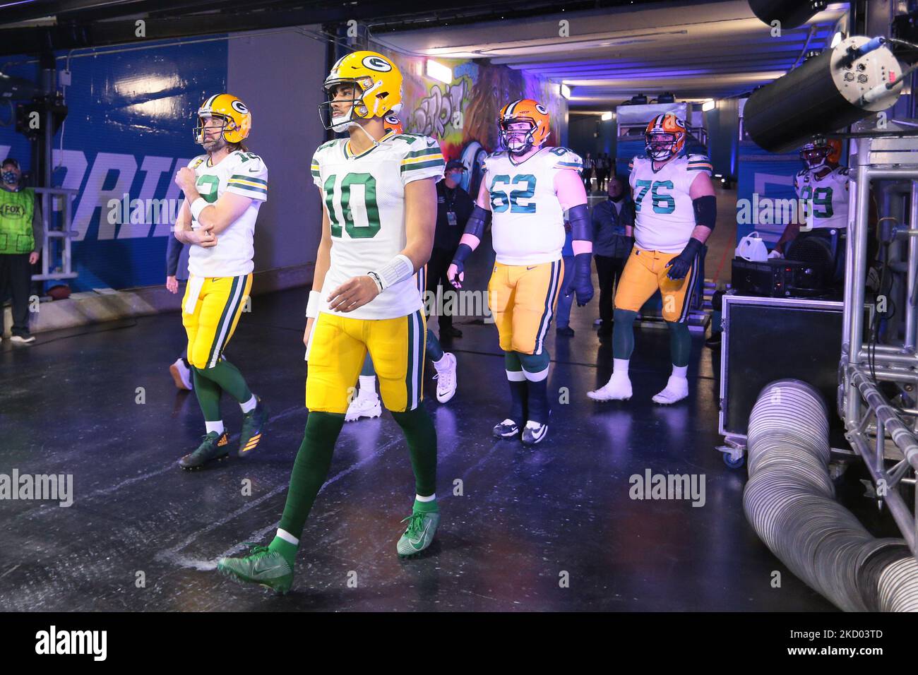 Green Bay Packers quarterback Aaron Rodgers (12) heads to the field ...