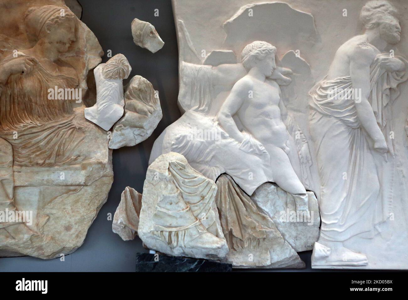 A marble fragment (Center) from the Parthenon, believed to depict the ...