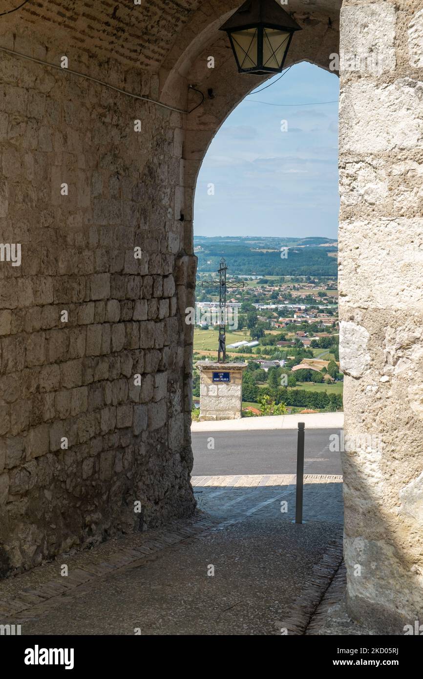 Picturesque architecture in early summer sunshine in Pujols, Lot-et ...