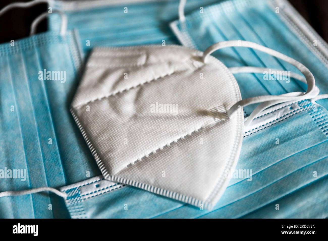 FFP2 face mask and disposable surgical face masks are seen in this ...