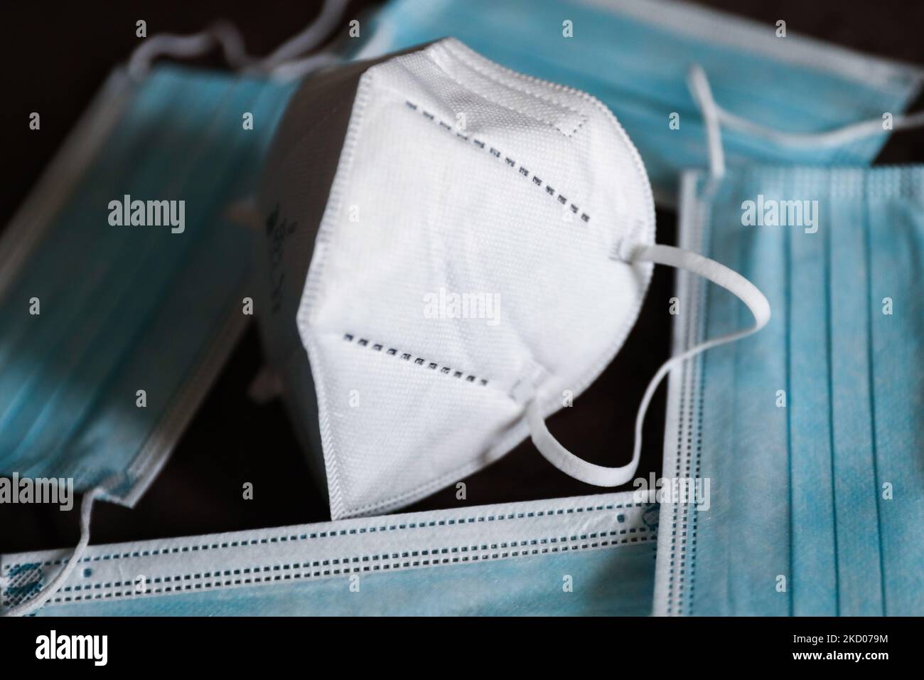 FFP2 face mask and disposable surgical face masks are seen in this ...