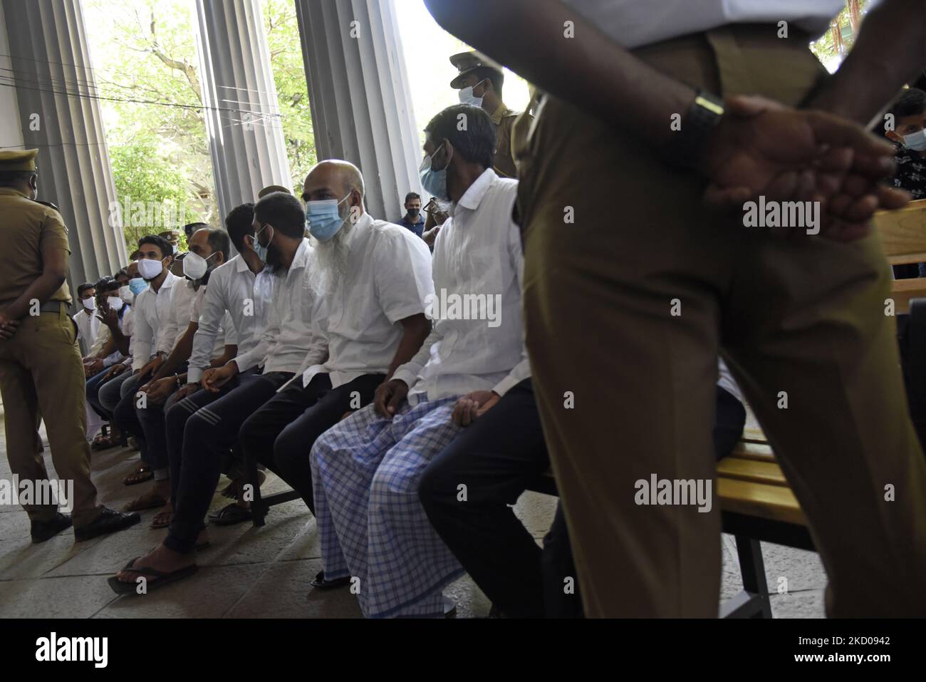 The suspects wait at Colombo High Court for a hearing of Easter Sunday ...