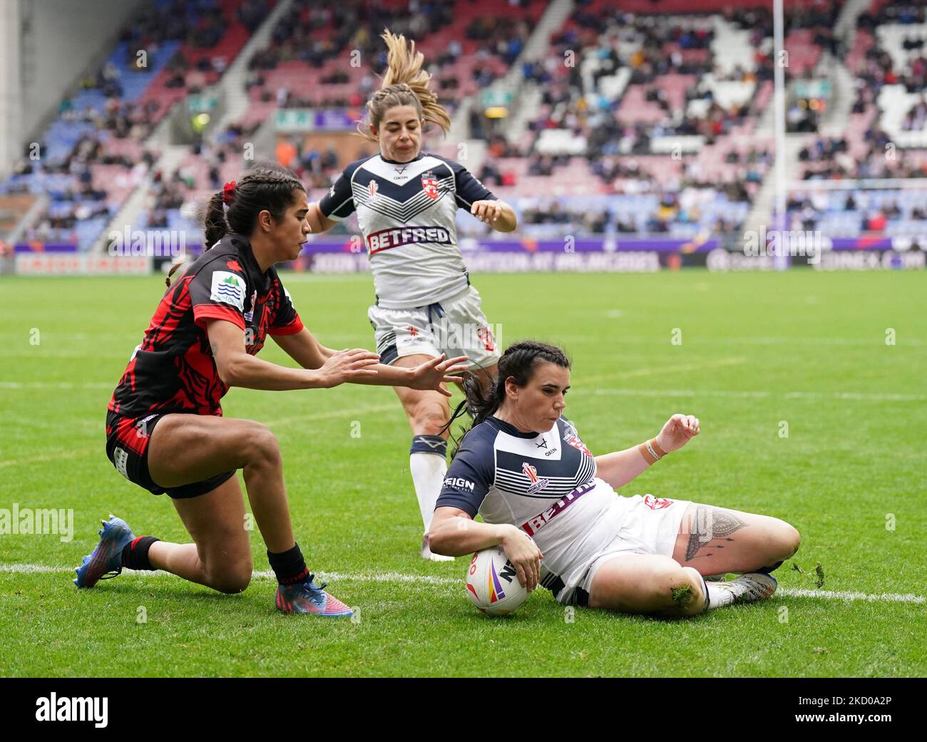 England's Carrie Roberts scores their side's tenth try during the Women ...