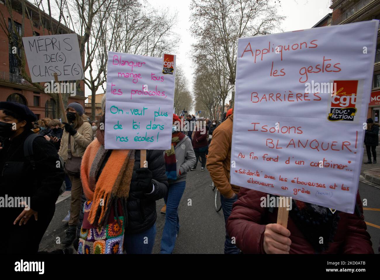 The left placard reads 'Let's us apply the protective measures, Isolate ...