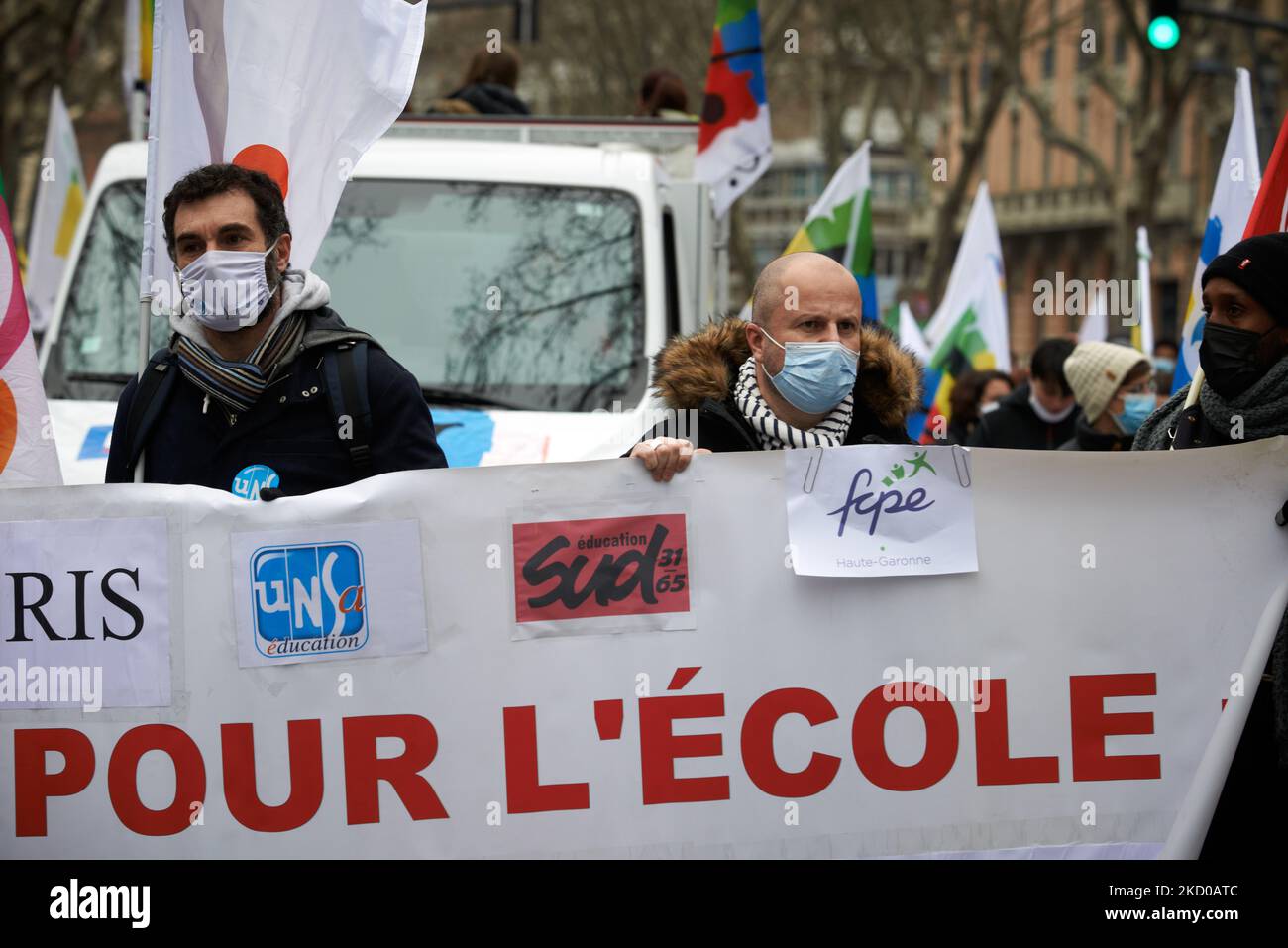 The banner reads 'for the school' .Thousands of teachers called by ...