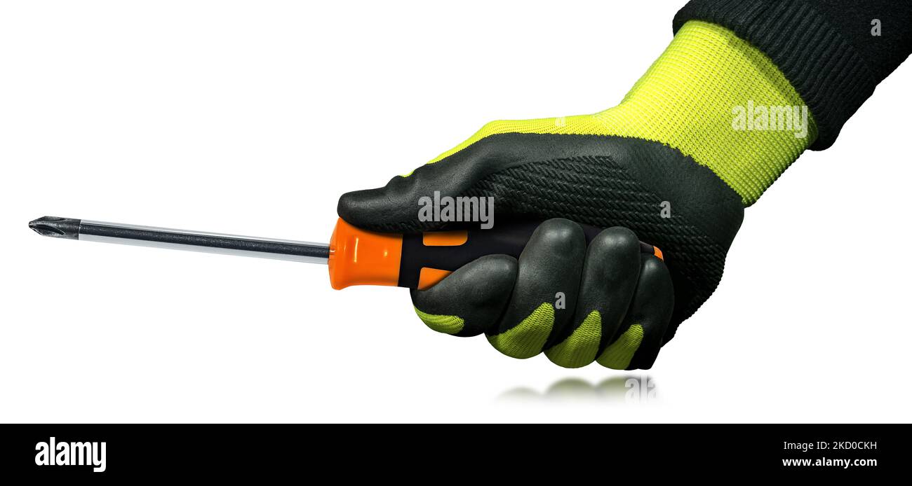 Manual worker with protective work gloves holding a phillips head ...