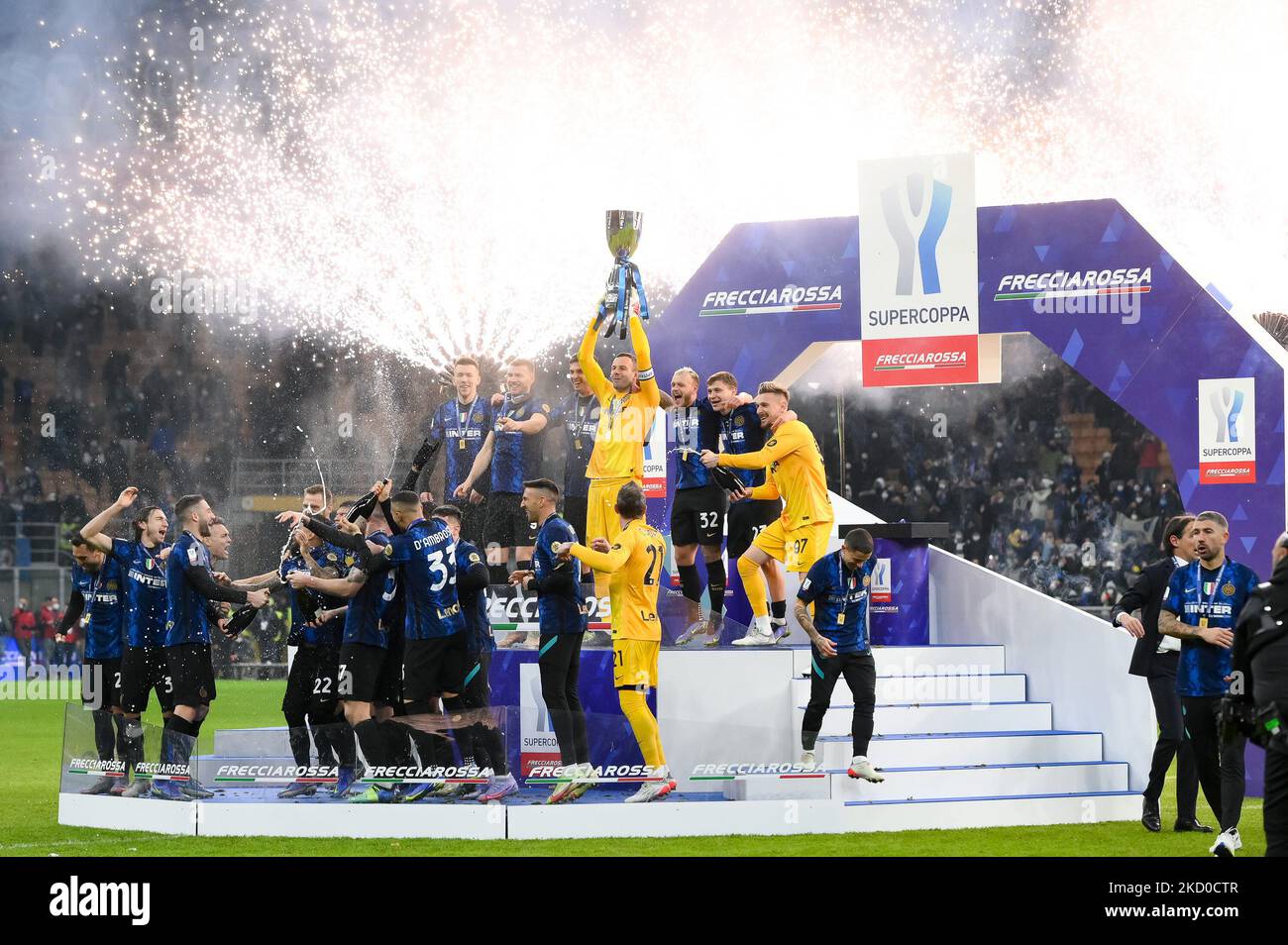 Samir Handanovic of FC Internazionale rises up the trophy with his ...