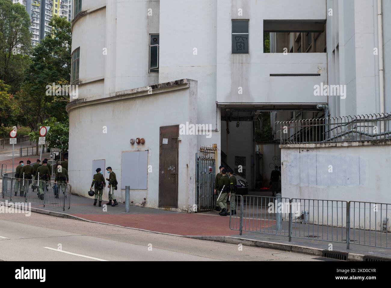Police cadets exit the former buildings of St. Joseph Anglo-Chinese ...