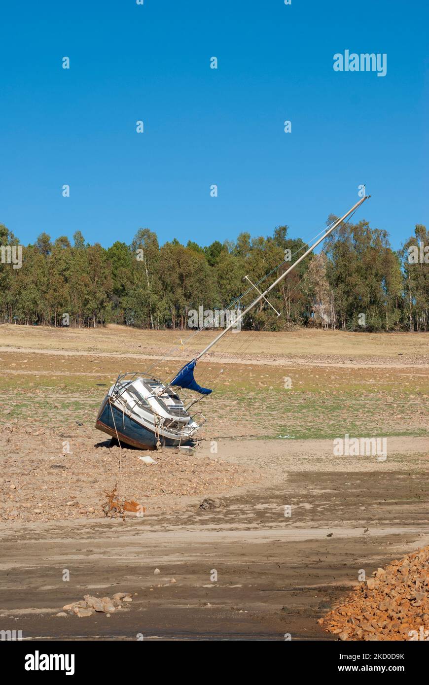 ship on land away from water due to drought in vertical Stock Photo - Alamy