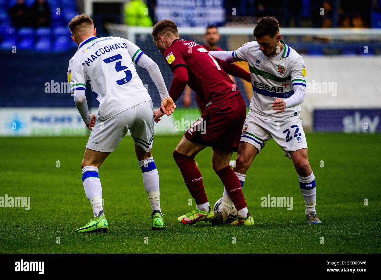 Stephen Dooley of Rochdale AFC is tackled by Lee O’Connor of Tranmere ...