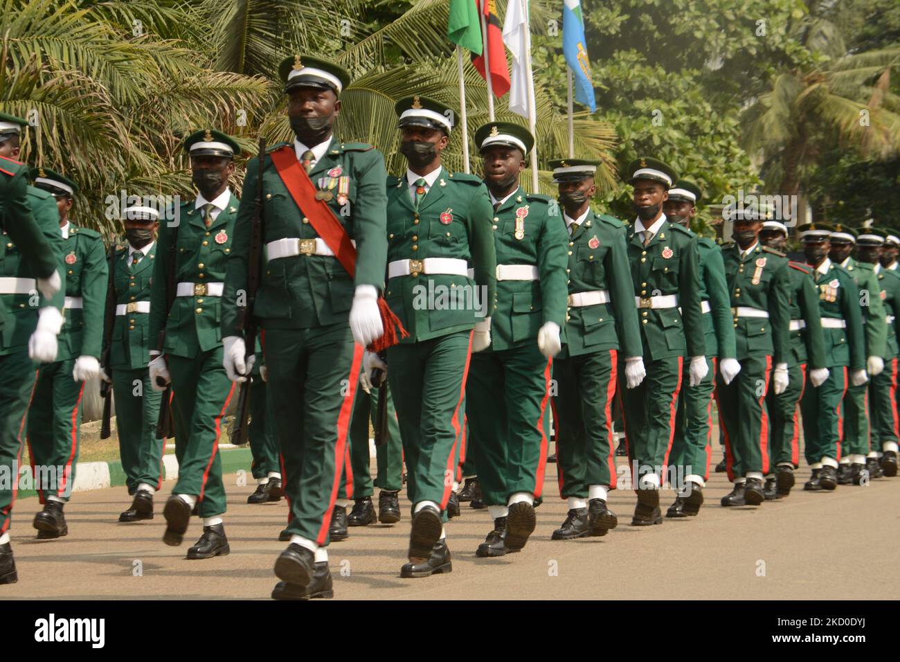 Members of the Nigerian Armed Forces stand in line carrying wreath during the commemoration of ...