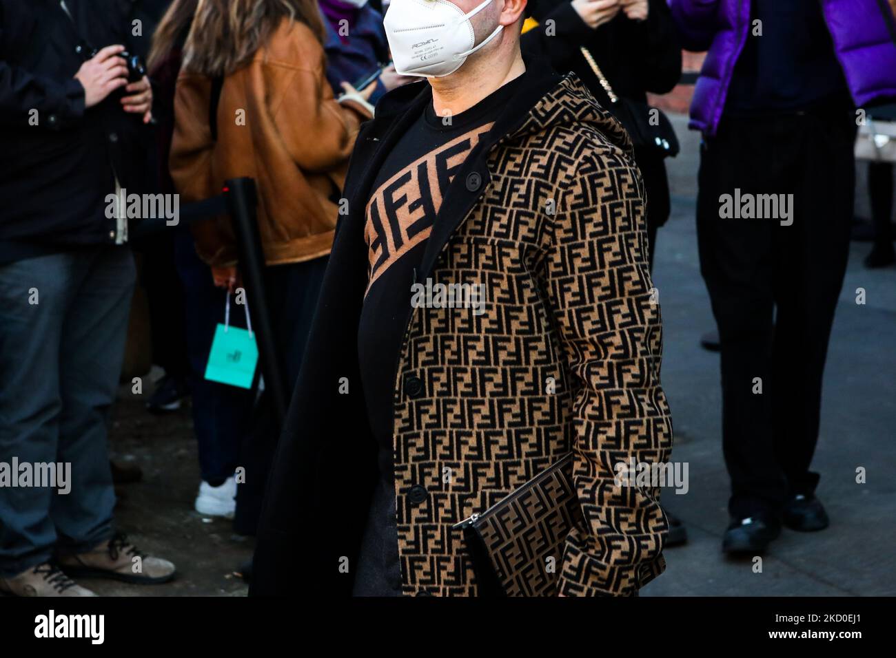 Guest wearing Fendi suit arrives at Fendi during the MFW 2022 in Milan ...