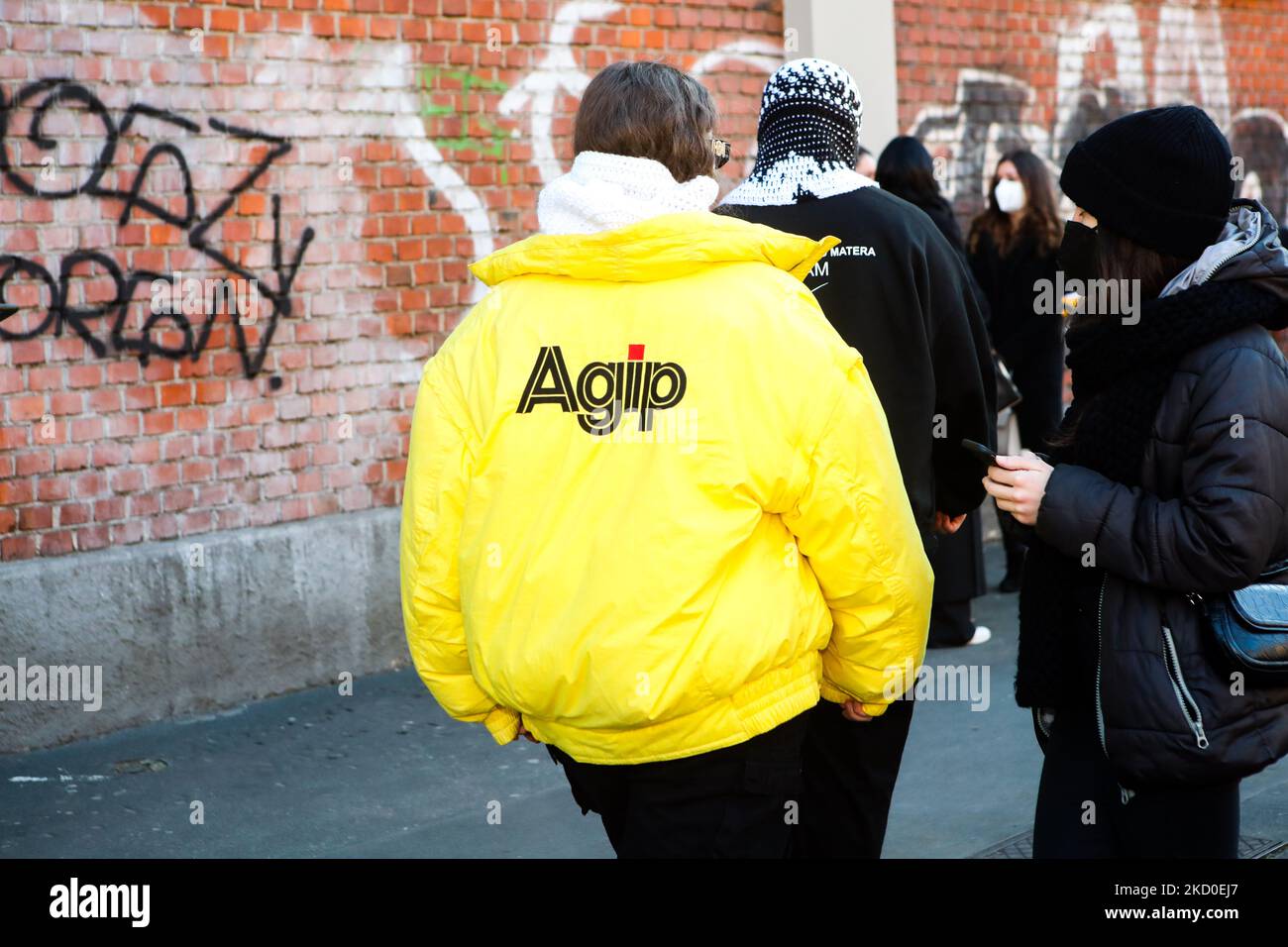 Guest wearing Agip jacket arrives at Fendi during the MFW 2022 in Milan ...