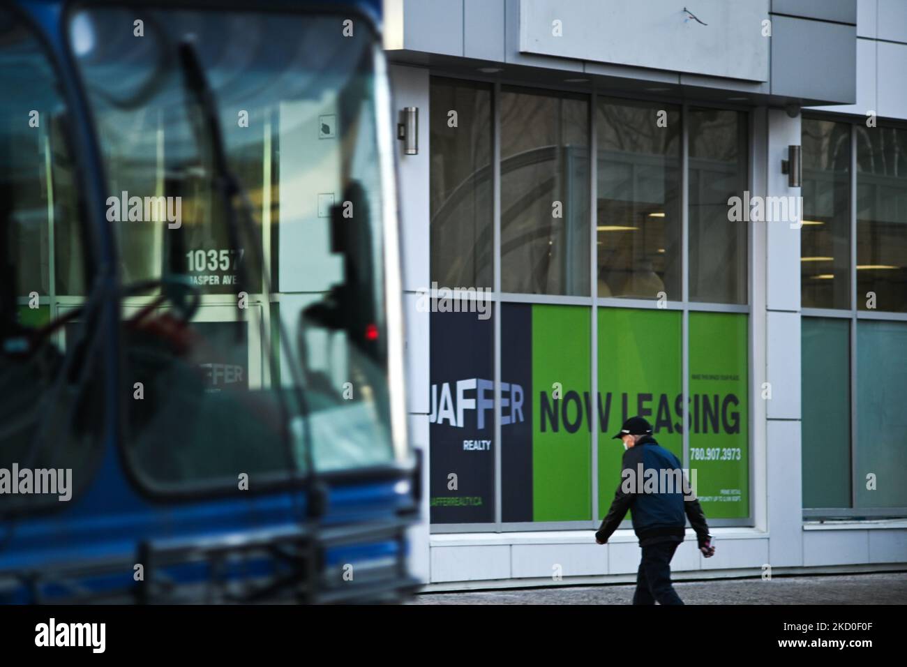 A sign 'Now Leasing' seen in the window of a business promisses in ...