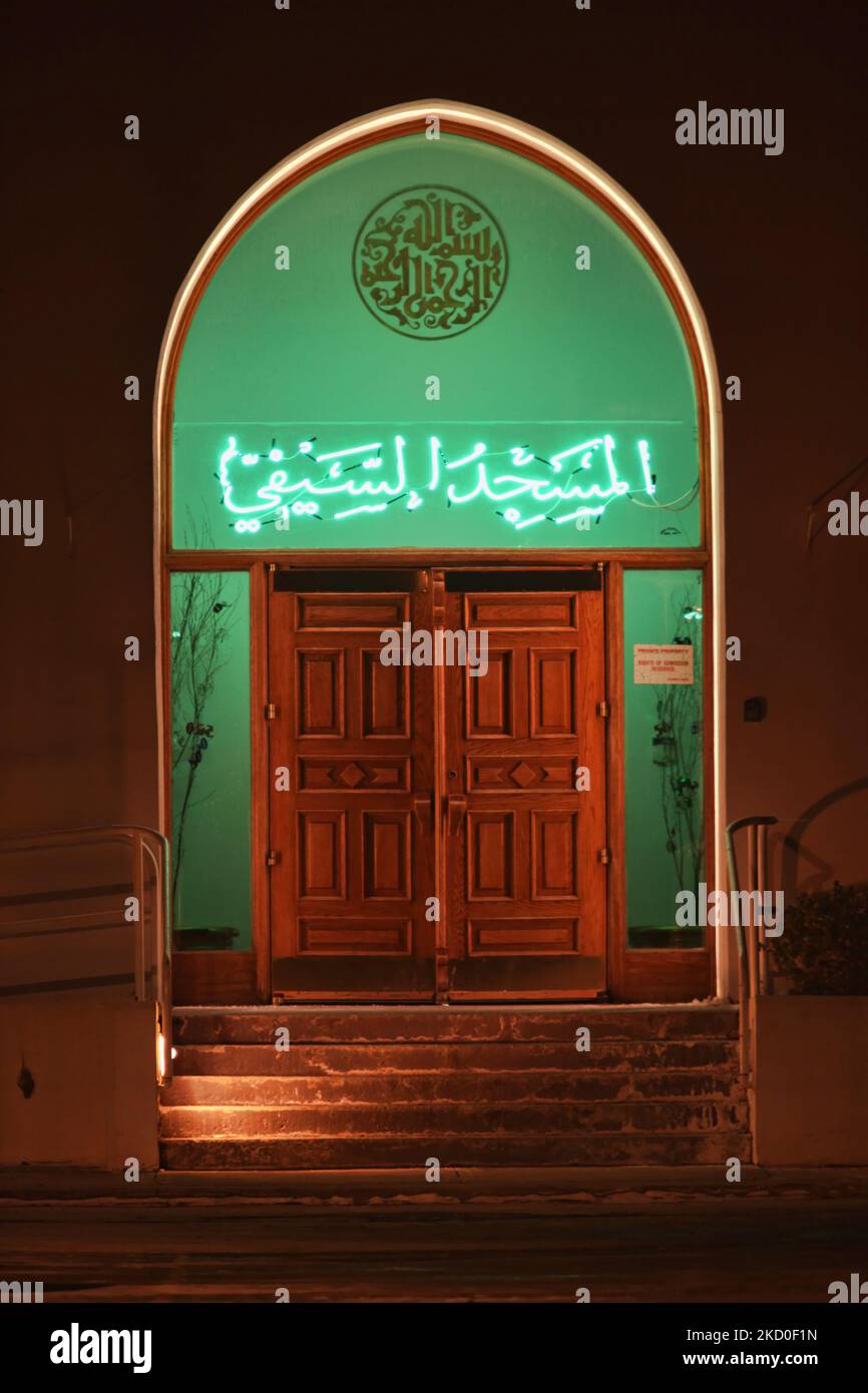 Religious Neon Arabic calligraphy above the doorway to the Anjuman-e-Burhani Mosque in Toronto ...