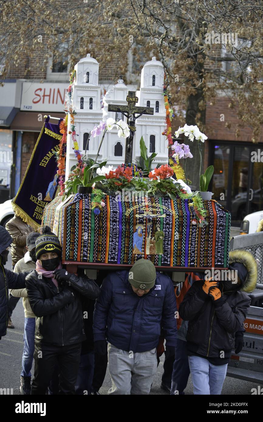 Catholic parishioners carry the procession of the replica of the Black ...