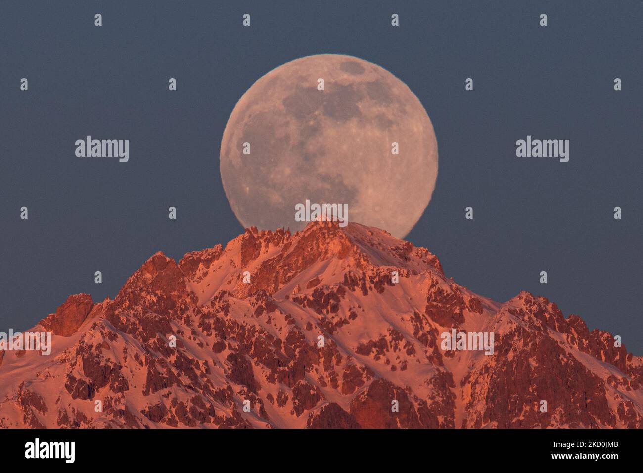 Full moon sets behind Monte Prena in Gran Sasso d'Italia National Park ...