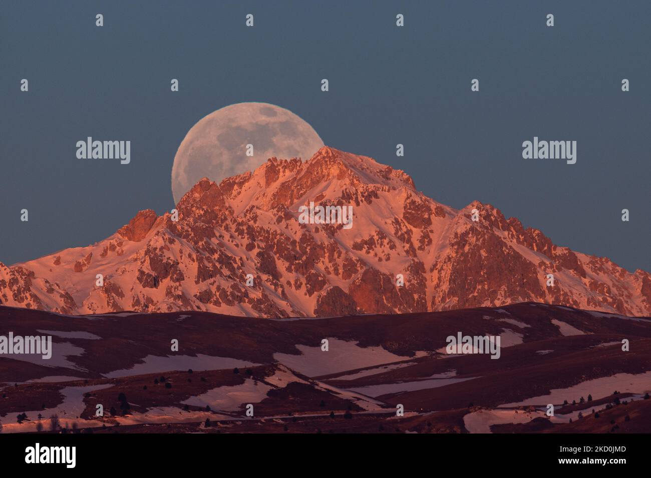 Full moon sets behind Monte Prena in Gran Sasso d'Italia National Park ...