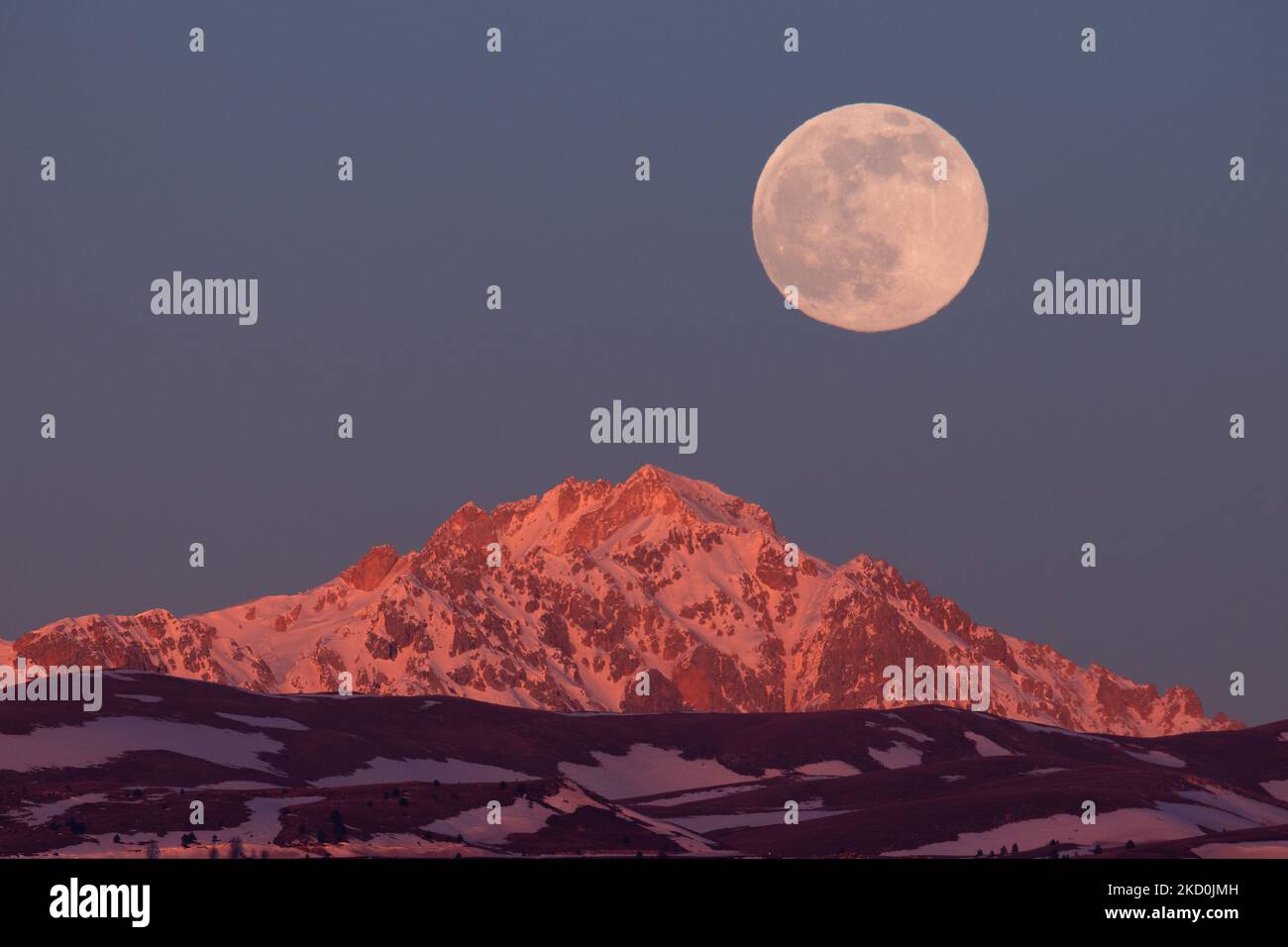 Full moon sets behind Monte Prena in Gran Sasso d'Italia National Park ...