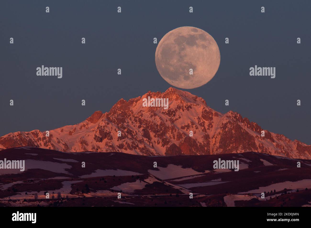 Full moon sets behind Monte Prena in Gran Sasso d'Italia National Park ...