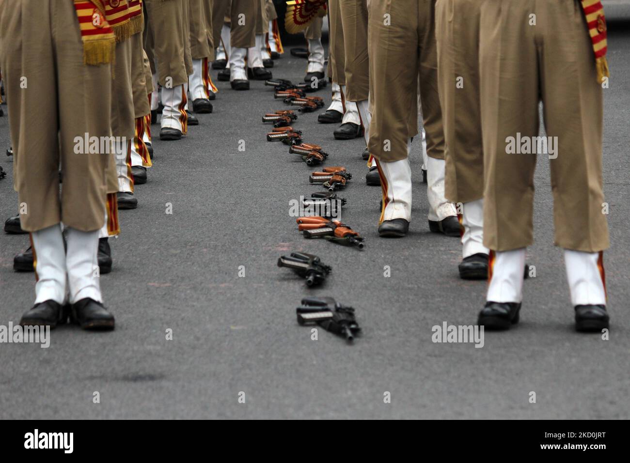 Guns of marching contingent of Indian soldiers are pictured as they ...