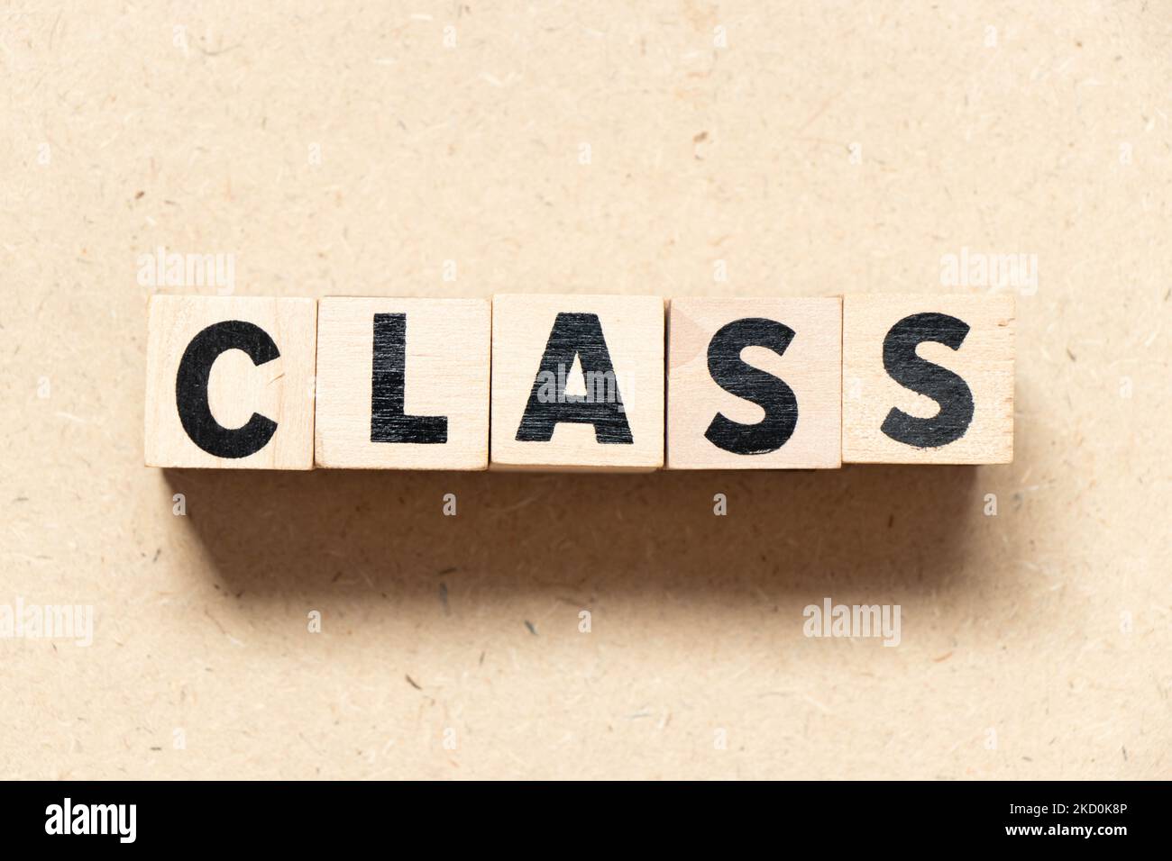 Alphabet letter block in word class on wood background Stock Photo - Alamy