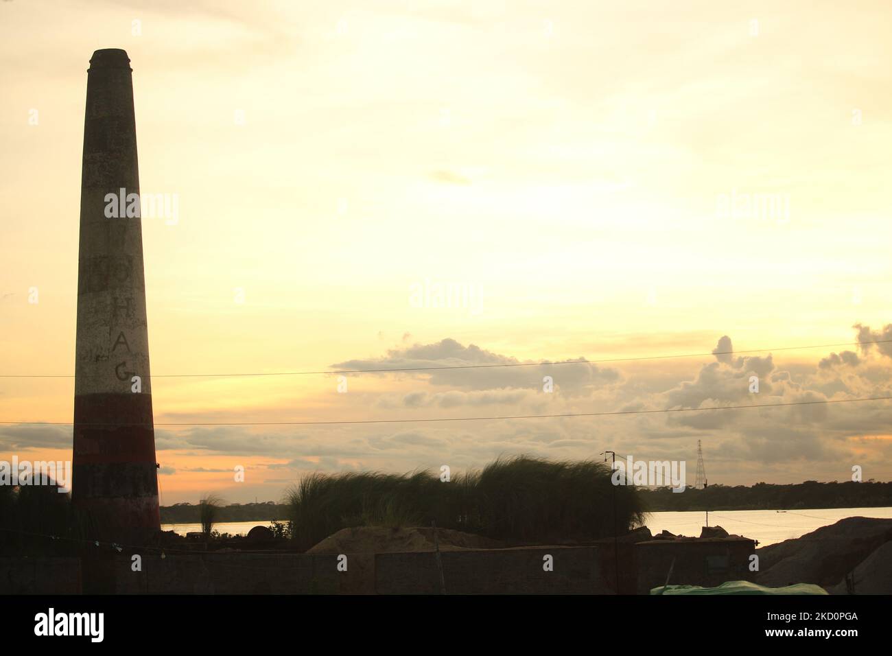 A brick kiln in a field at a remote location in Bangladesh. It is used ...