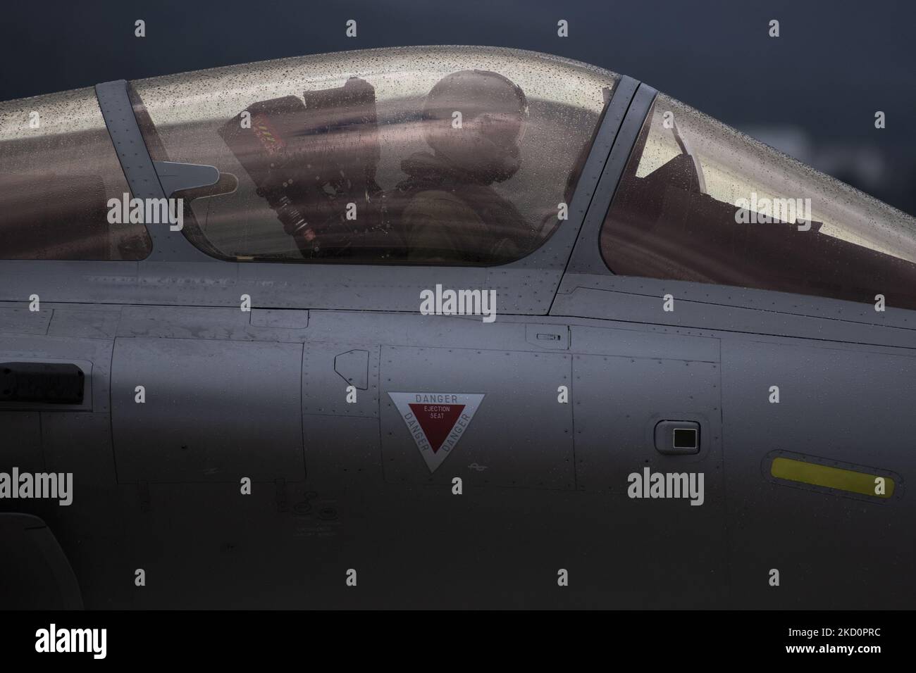 A pilot is seen in a Rafale fighter jet, after landing in Tanagra Air ...