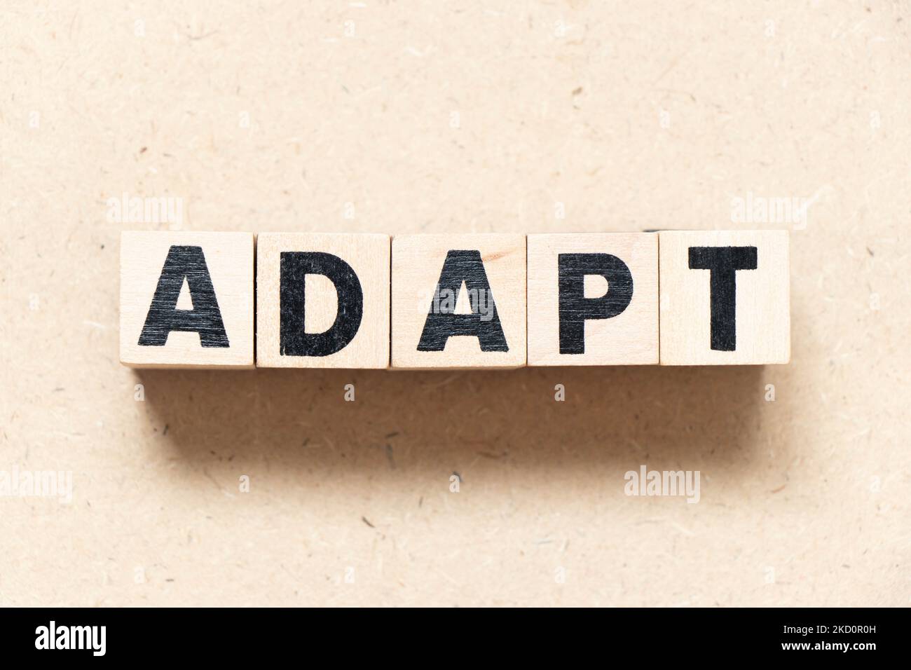 Alphabet letter block in word adapt on wood background Stock Photo - Alamy