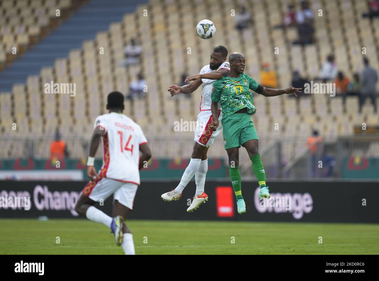 Ibrahima Cissé of Guinea and Knowledge Musona of Zimbabwe during Guinea ...