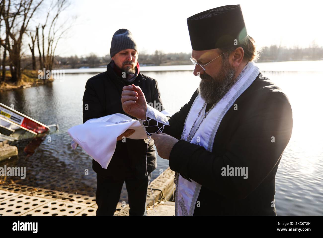 A priest of the Eastern Orthodox Church prepares to celebrate the ...