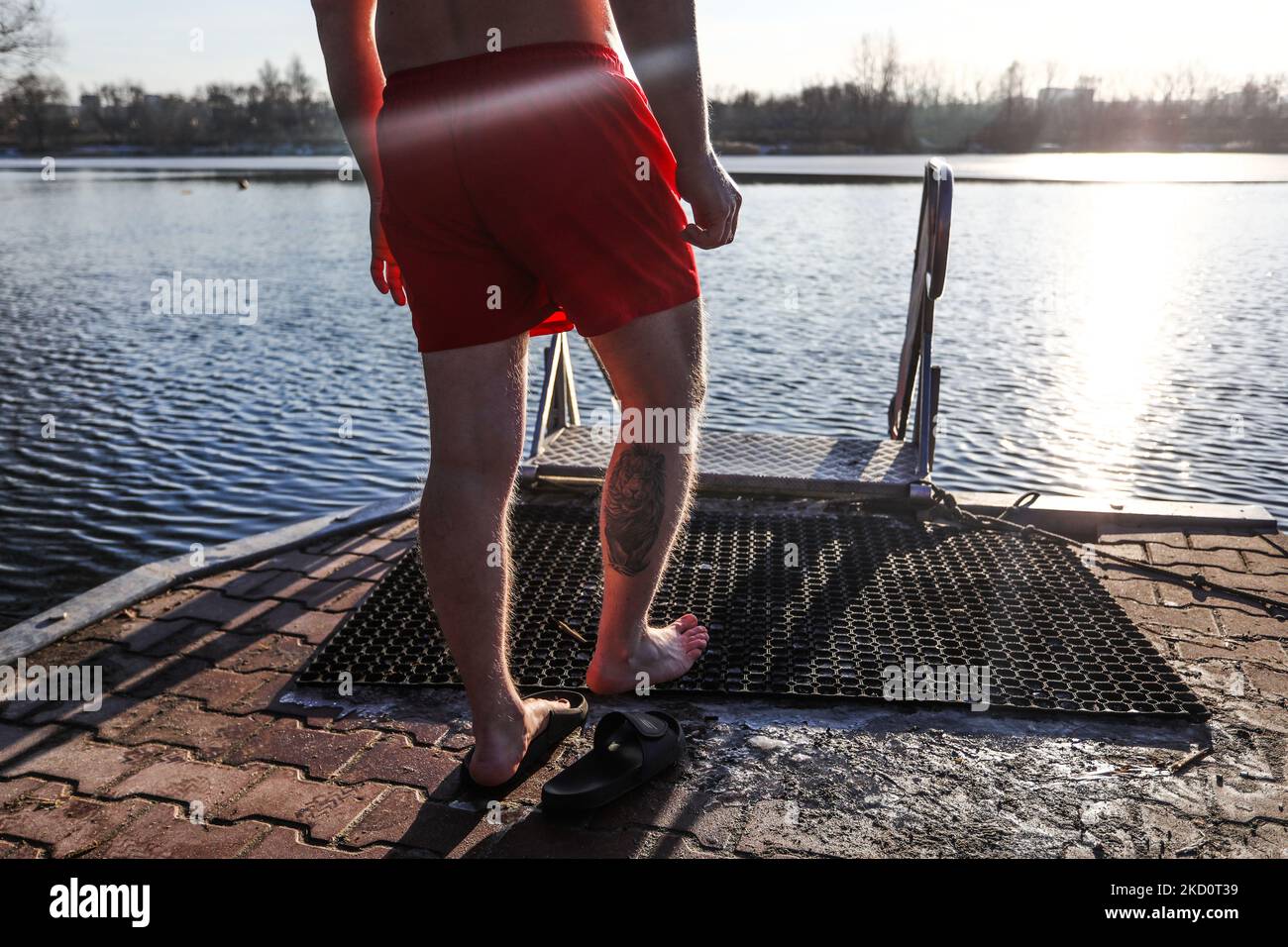 A member of the Eastern Orthodox Church is seen before taking a bath in ...