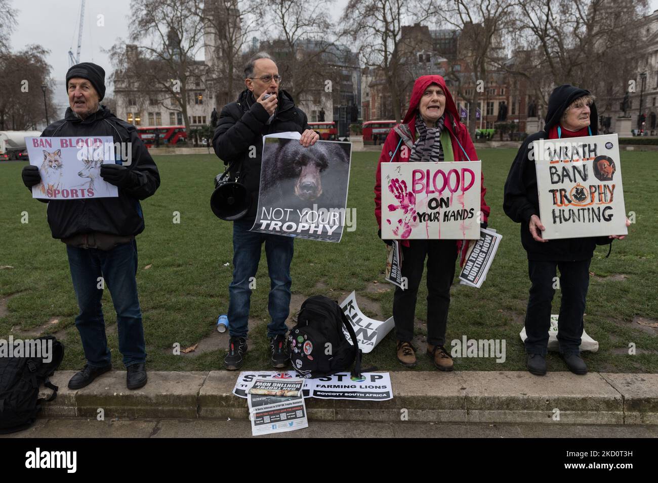 LONDON, UNITED KINGDOM - JANUARY 19, 2022: Demonstrators hold placards ...