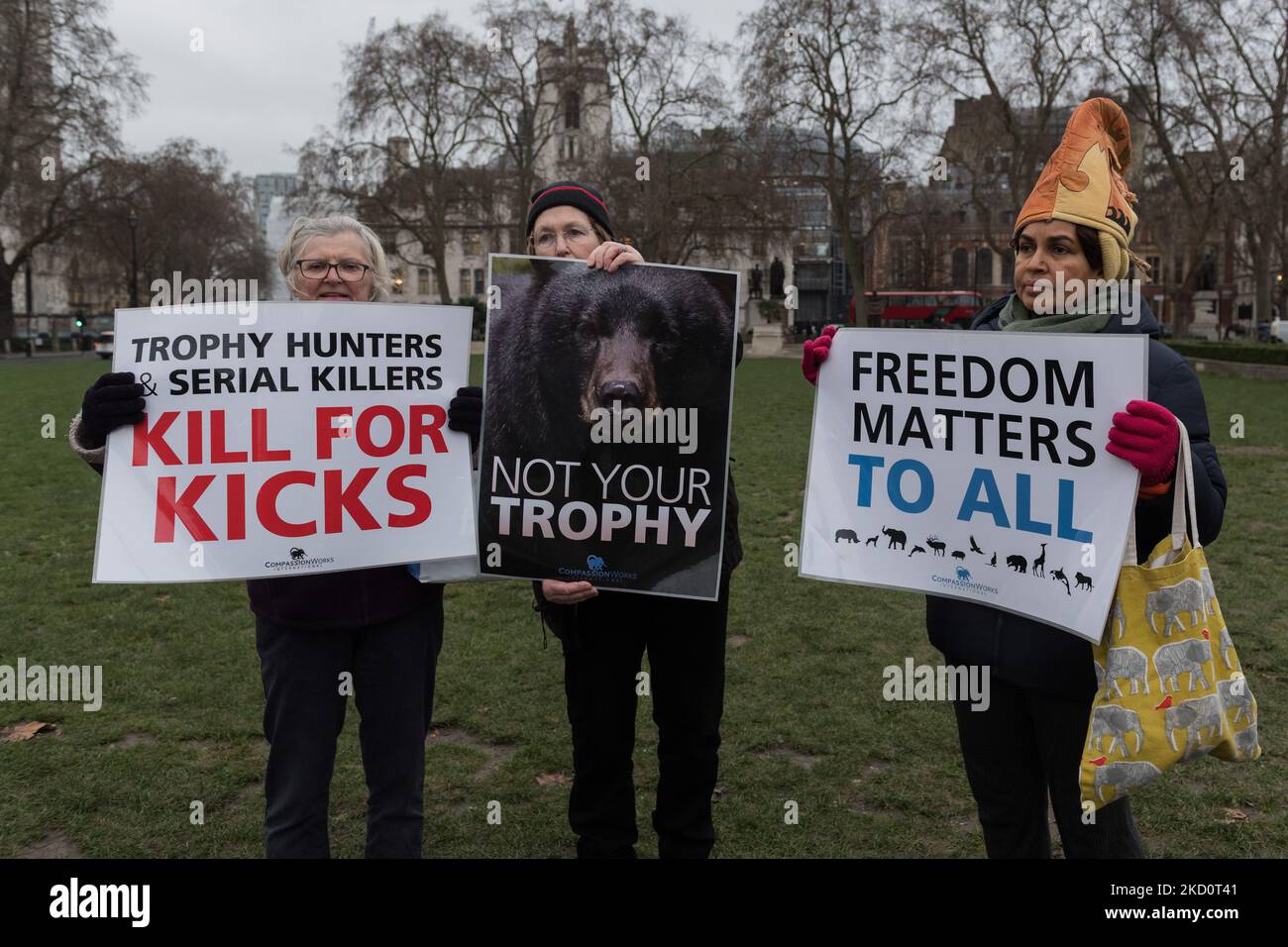 LONDON, UNITED KINGDOM - JANUARY 19, 2022: Demonstrators hold placards ...