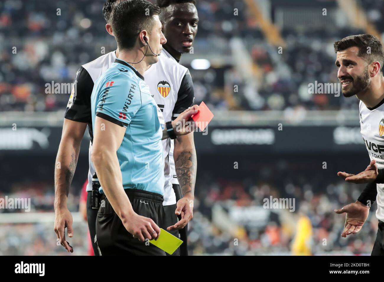 Soto Grado referee show red card to Jose Luis Gaya of Valencia CF ...