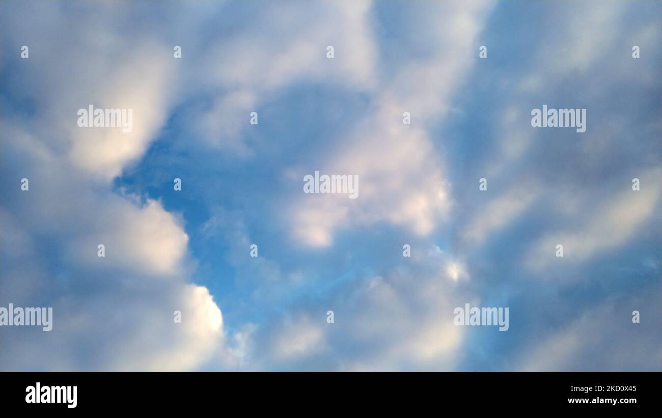 Cumulus clouds on sky. Nature background. Weather change Stock Photo ...