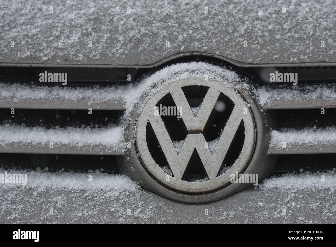 Volkswagen logo seen on a Volkswagen car covered with snow. On Friday ...