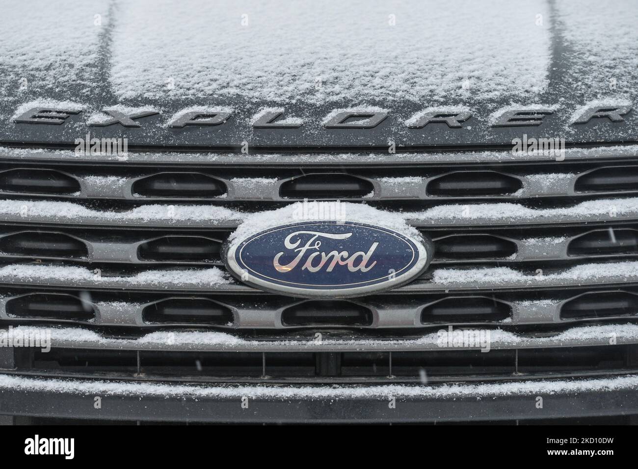 Ford logo seen on a Ford car covered with snow. On Friday, January 21 ...