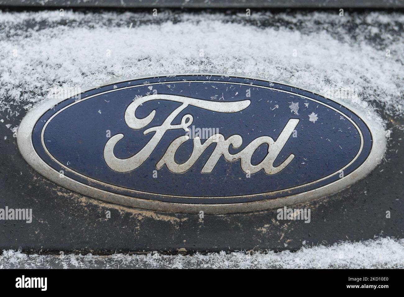 Ford logo seen on a Ford car covered with snow. On Friday, January 21 ...