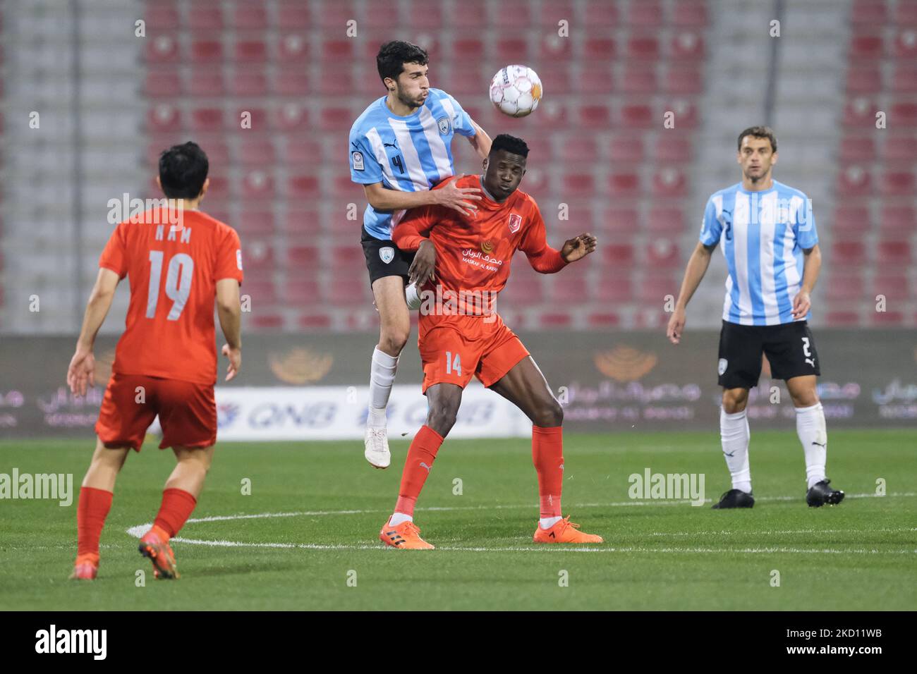 Mohammed Emad Ayash (4) of Al Wakrah wins a header during the QNB Stars League match between Al ...