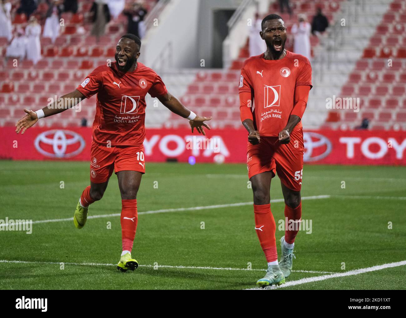 Abdulgadir Ilyas Bakur (55) of Al Arabi celebrates his goal with Adama ...